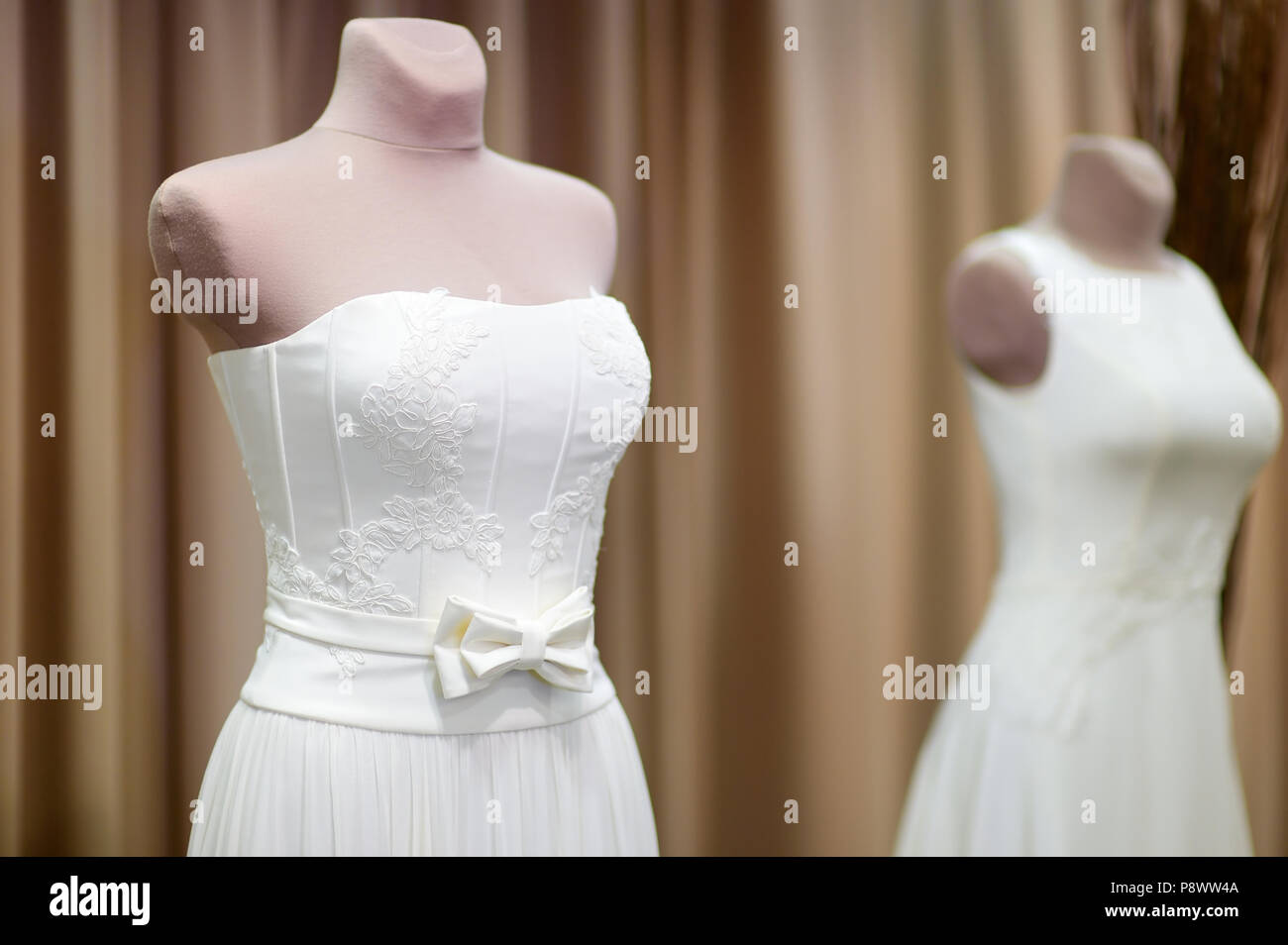 Beautiful wedding dresses on a mannequins Stock Photo - Alamy
