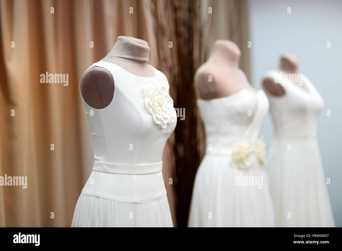 Beautiful wedding dresses on a mannequins Stock Photo - Alamy