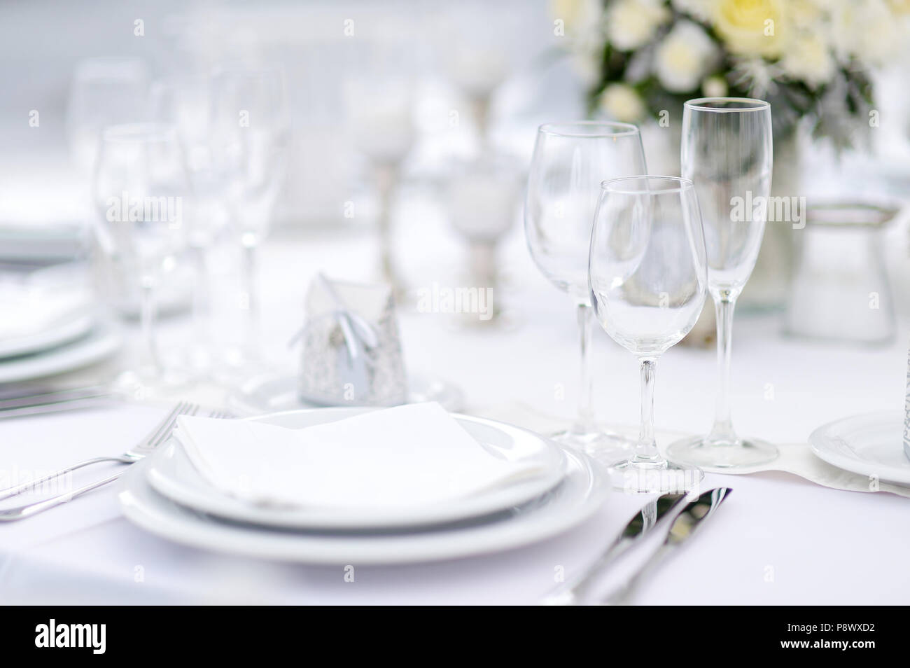 Beautiful table set for some festive event, party or wedding reception ...