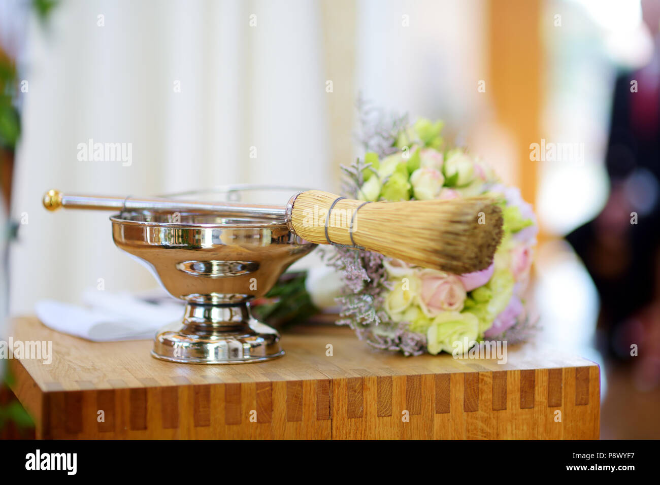 Bridal bouquet in a chruch during wedding ceremony Stock Photo - Alamy