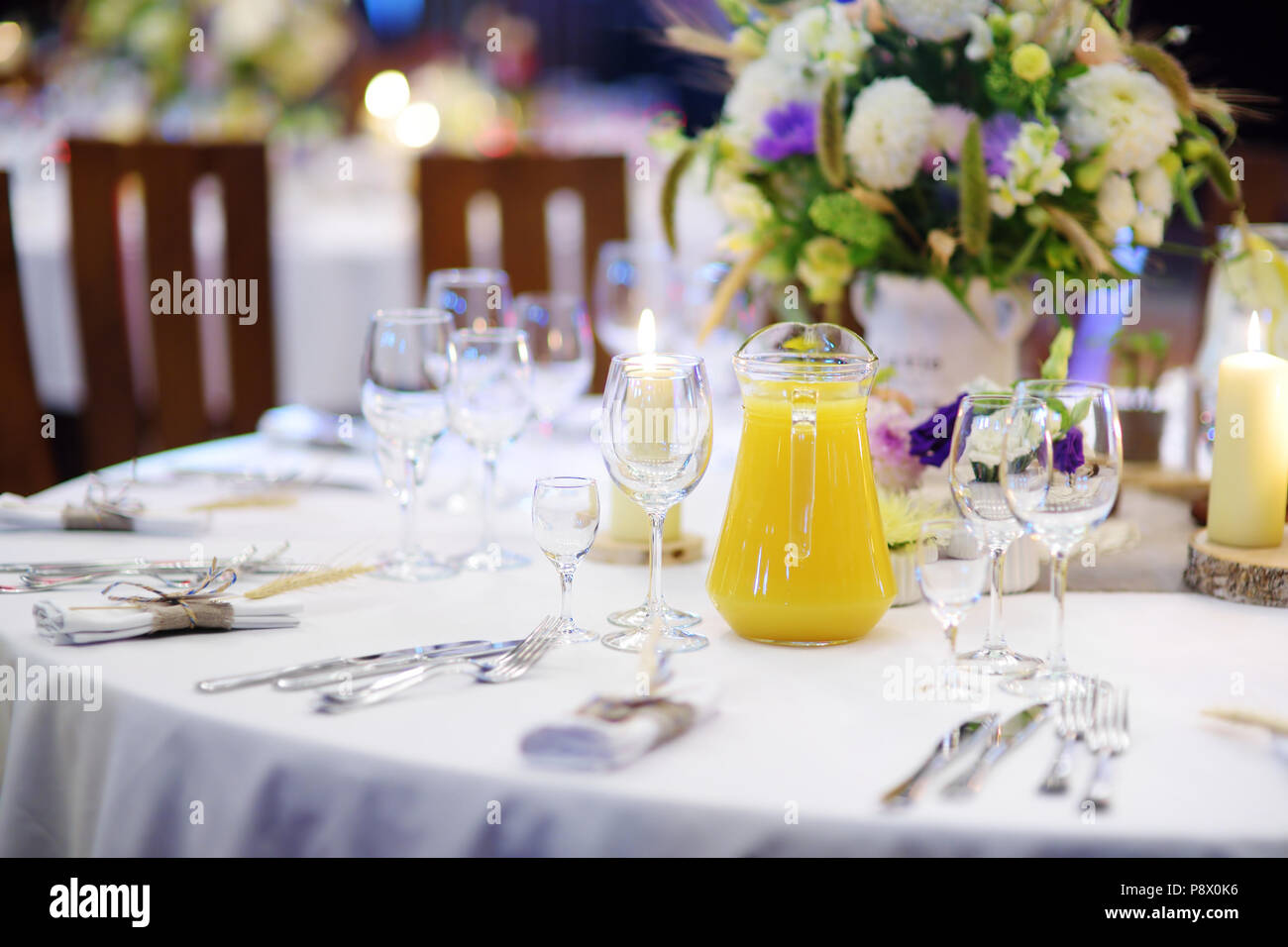 Beautiful table set for some festive event, party or wedding reception ...
