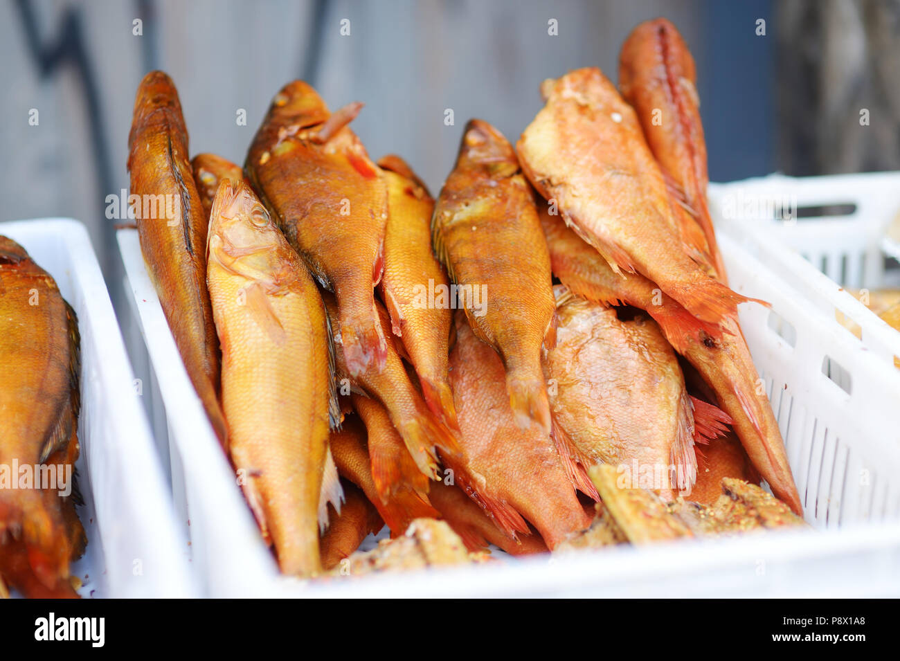 Smoked fish on a farmer's market in Vilnius, Lithuania Stock Photo - Alamy