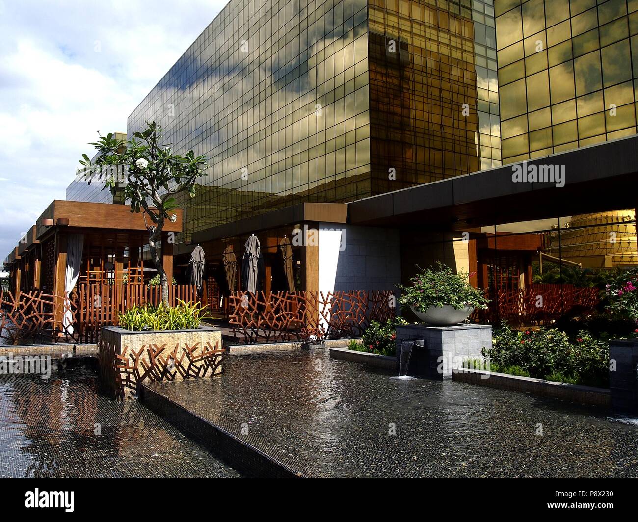 PARANAQUE, METRO MANILA, PHILIPPINES - JANUARY 17, 2017: Outdoor garden ...