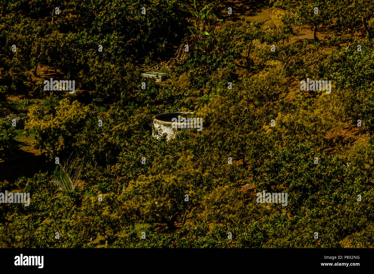 Concrete irrigation basin on high hills in Andalusia, a place of water ...