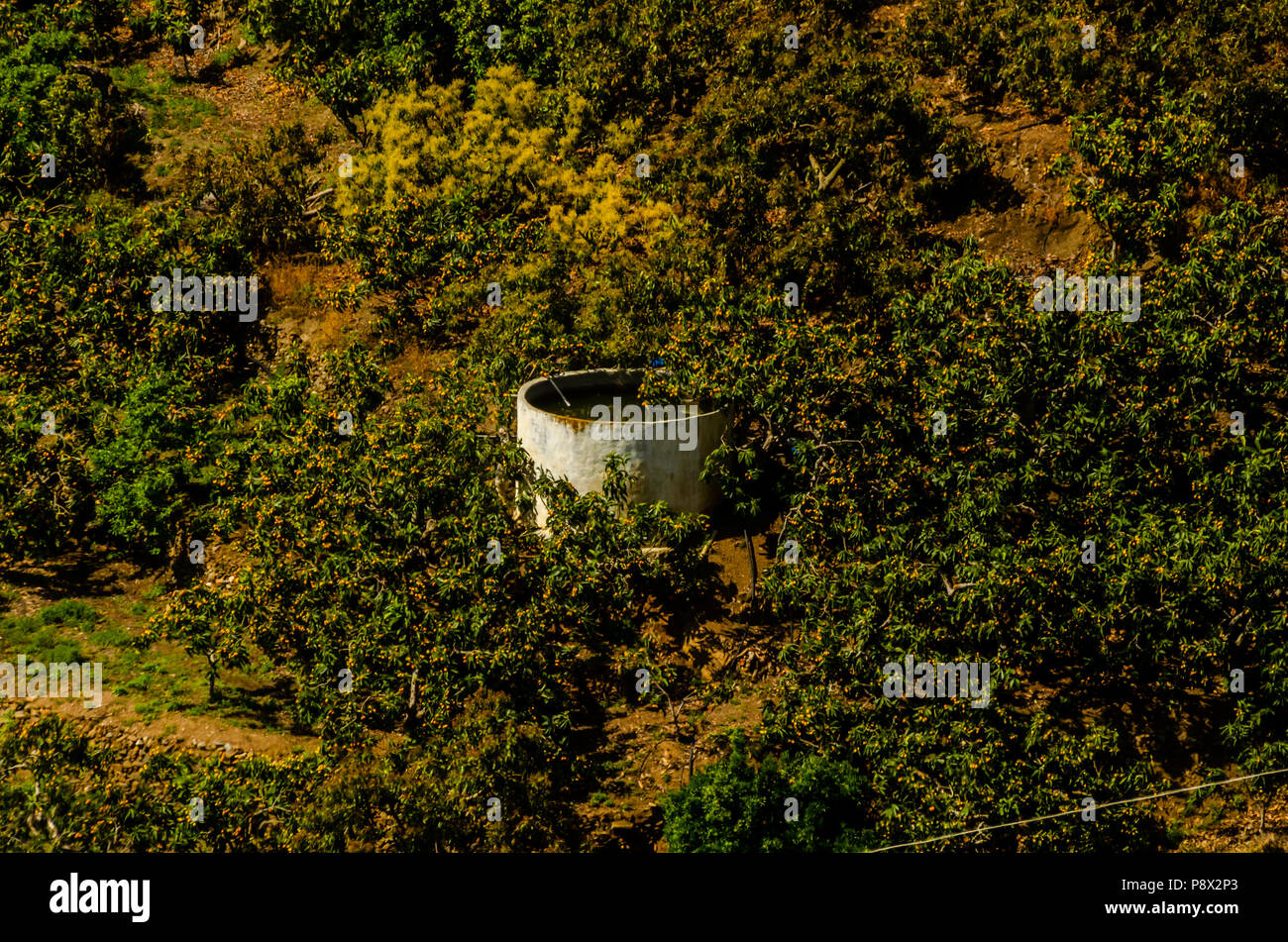 Concrete irrigation basin on high hills in Andalusia, a place of water ...