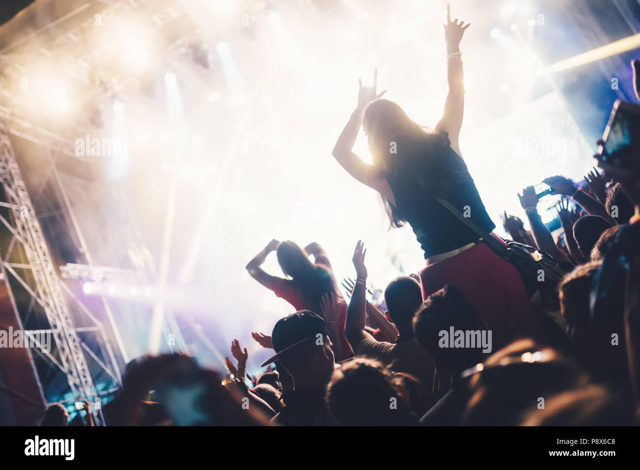 Portrait of happy crowd enjoying at music festival Stock Photo - Alamy