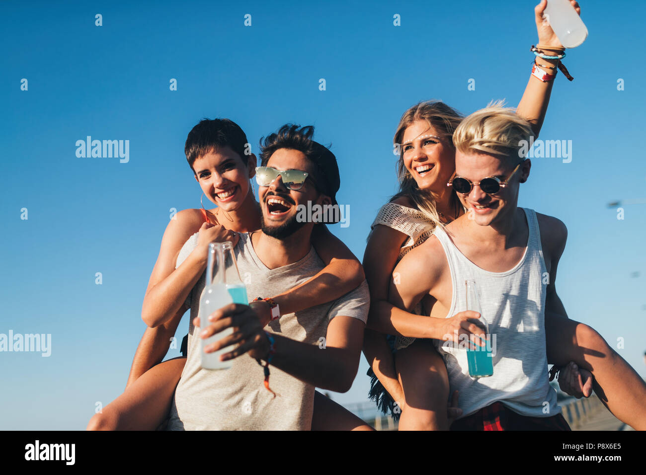 Group of young happy friends having fun time Stock Photo - Alamy