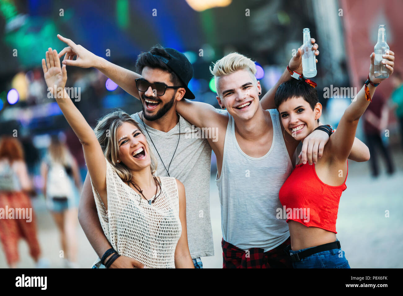 Group of friends having fun time at music festival Stock Photo - Alamy
