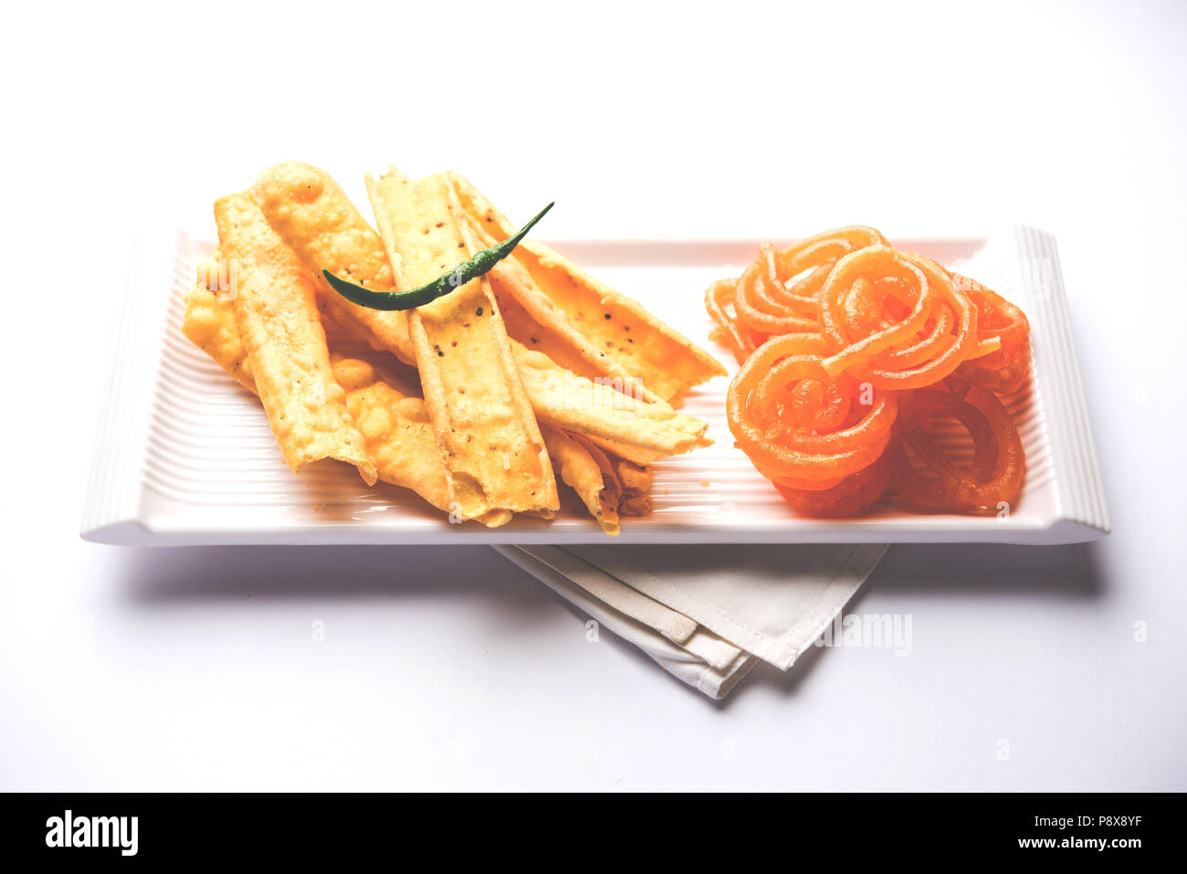 Crispy Fafda with sweet jalebi is an Indian snack most popular in ...