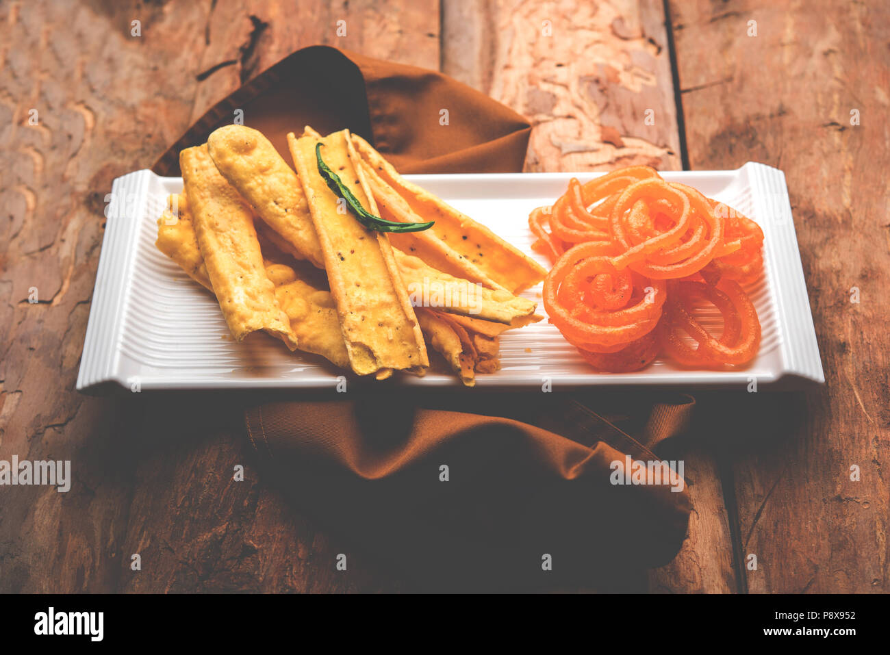 Crispy Fafda with sweet jalebi is an Indian snack most popular in ...