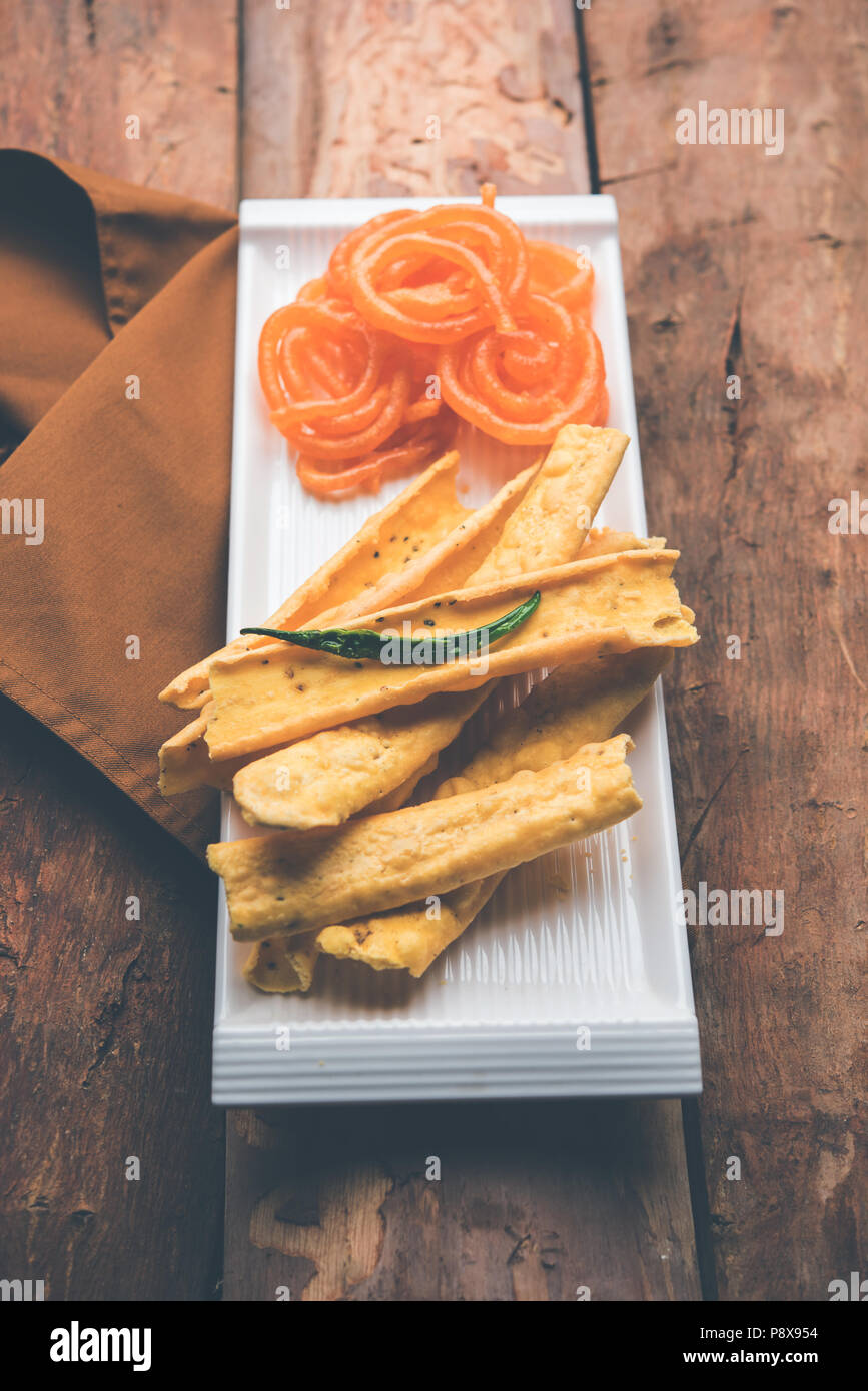 Crispy Fafda with sweet jalebi is an Indian snack most popular in ...
