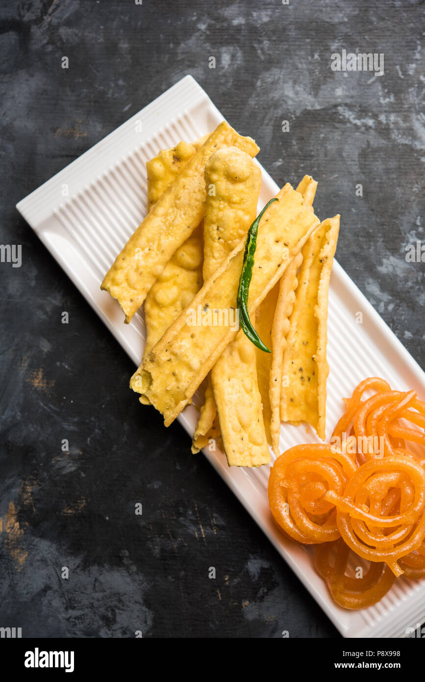 Crispy Fafda with sweet jalebi is an Indian snack most popular in ...