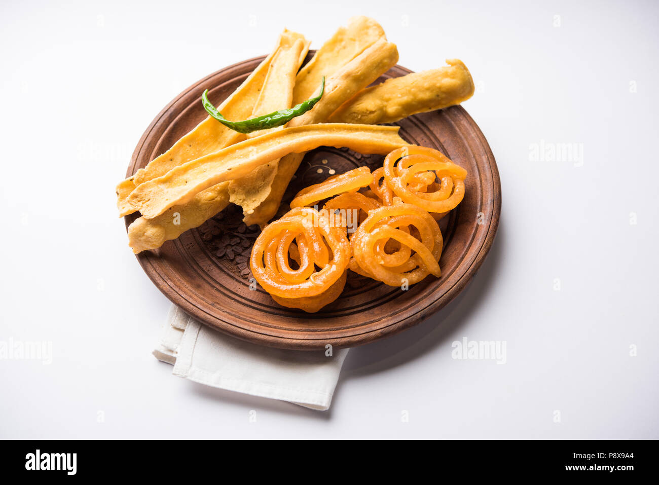 Crispy Fafda with sweet jalebi is an Indian snack most popular in ...