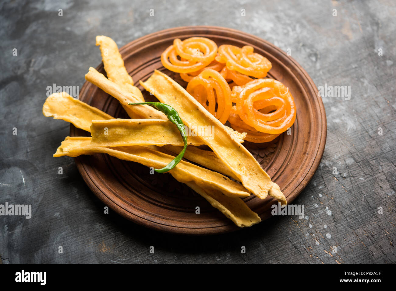 Crispy Fafda with sweet jalebi is an Indian snack most popular in ...