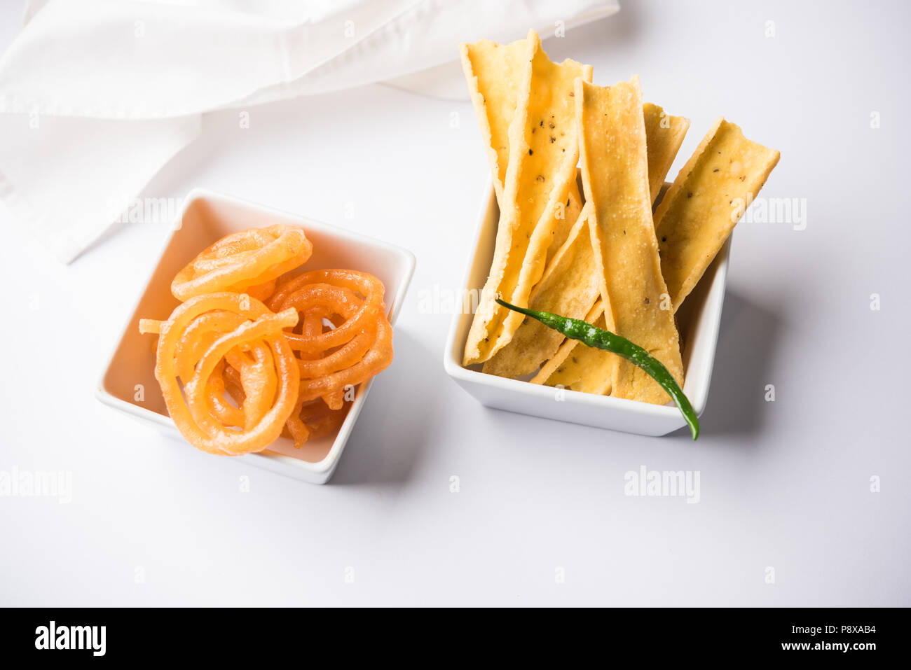 Crispy Fafda with sweet jalebi is an Indian snack most popular in ...