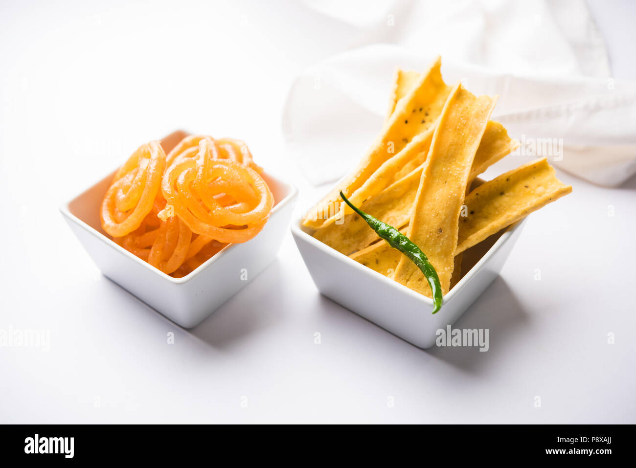 Crispy Fafda with sweet jalebi is an Indian snack most popular in ...