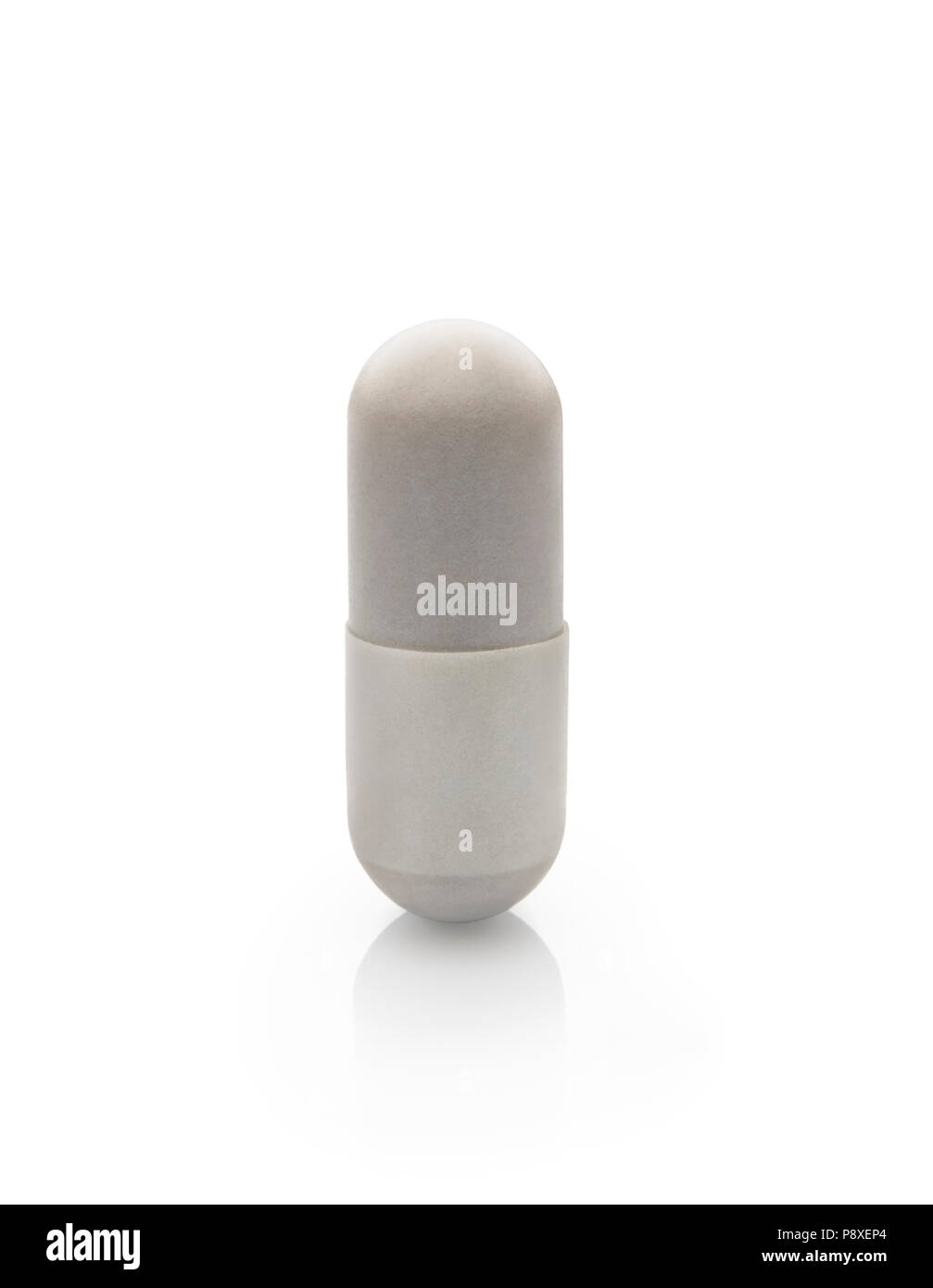 Close Up view of one pill isolated against white background Stock Photo ...