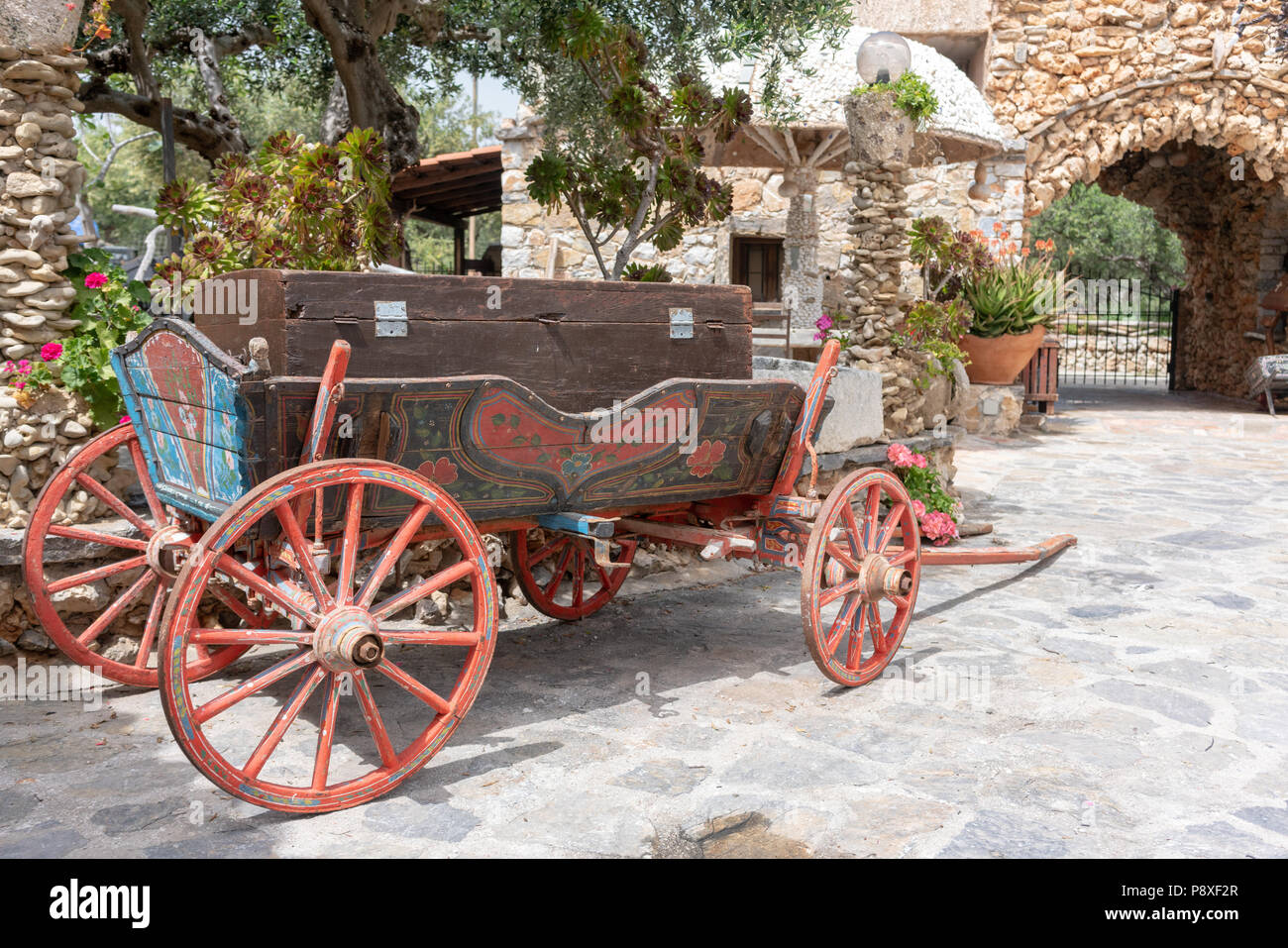 Vintage wooden cart at Koumos Stone House and restaurant at Kalyves ...