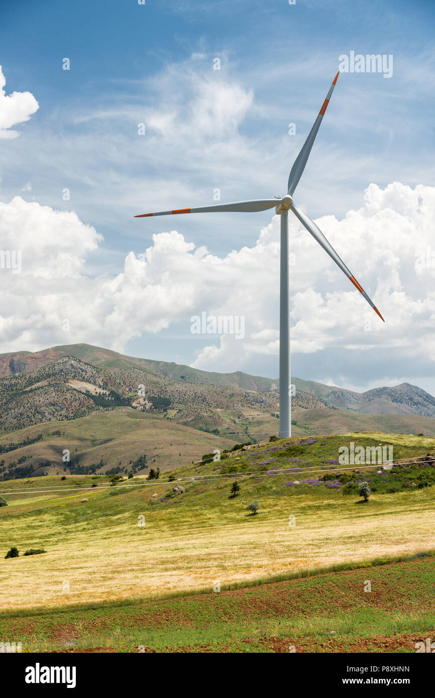Wind energy, modern wind turbine in mountains Stock Photo - Alamy