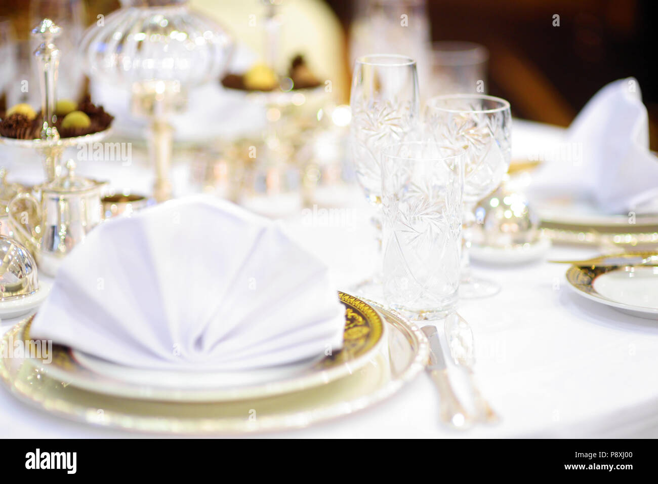 Beautiful table set for some festive event, party or wedding reception ...