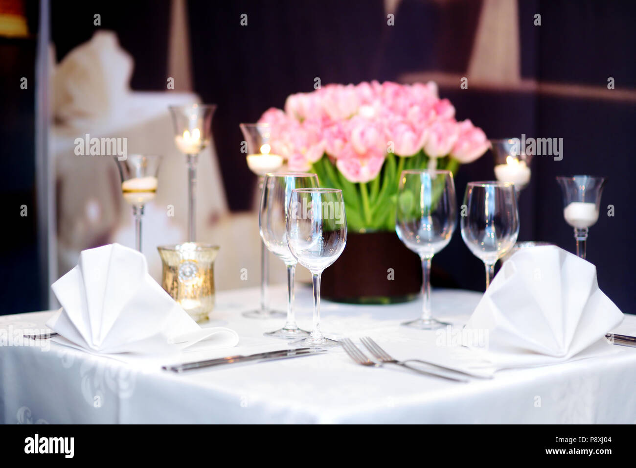 Beautiful table set for some festive event, party or wedding reception ...