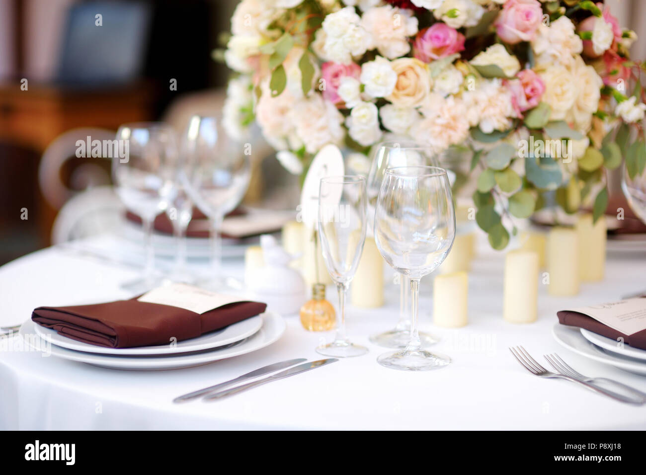 Beautiful table set for some festive event, party or wedding reception ...