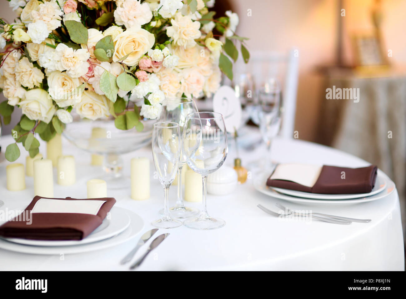 Beautiful table set for some festive event, party or wedding reception ...