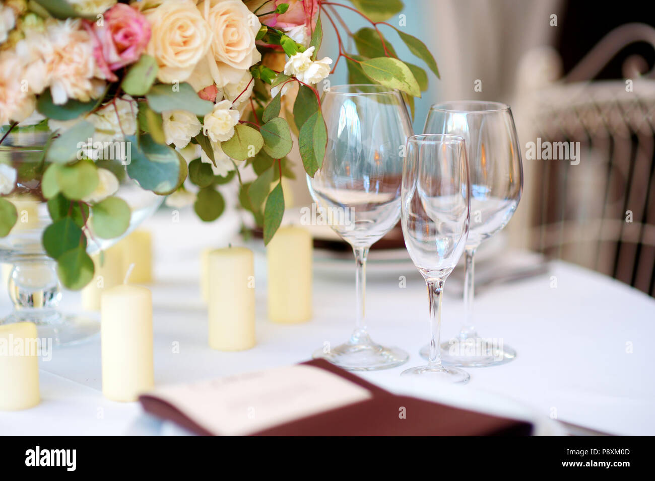 Beautiful table set for some festive event, party or wedding reception ...