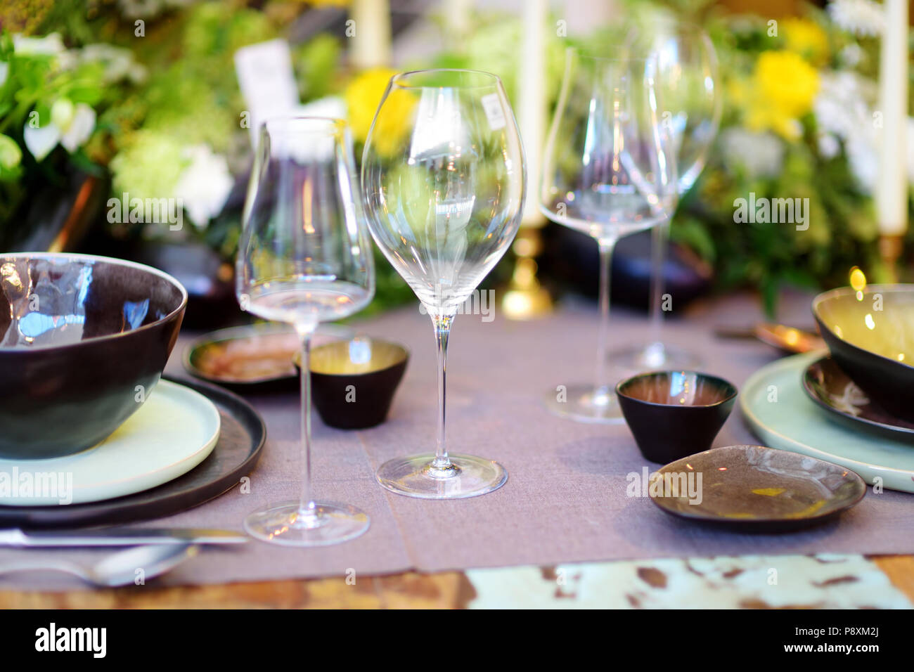 Beautiful table set for some festive event, party or wedding reception ...