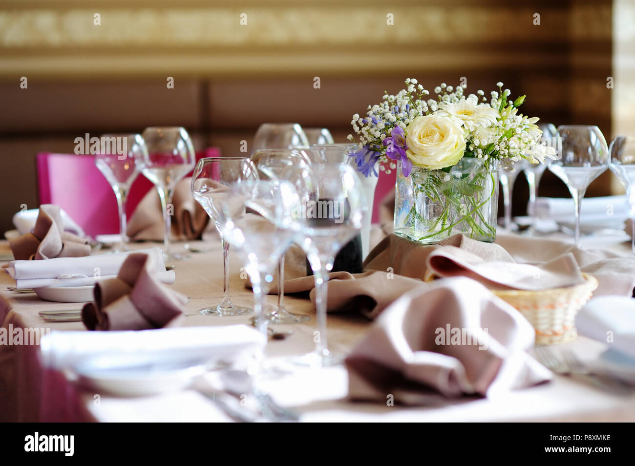 Beautiful table set for some festive event, party or wedding reception ...
