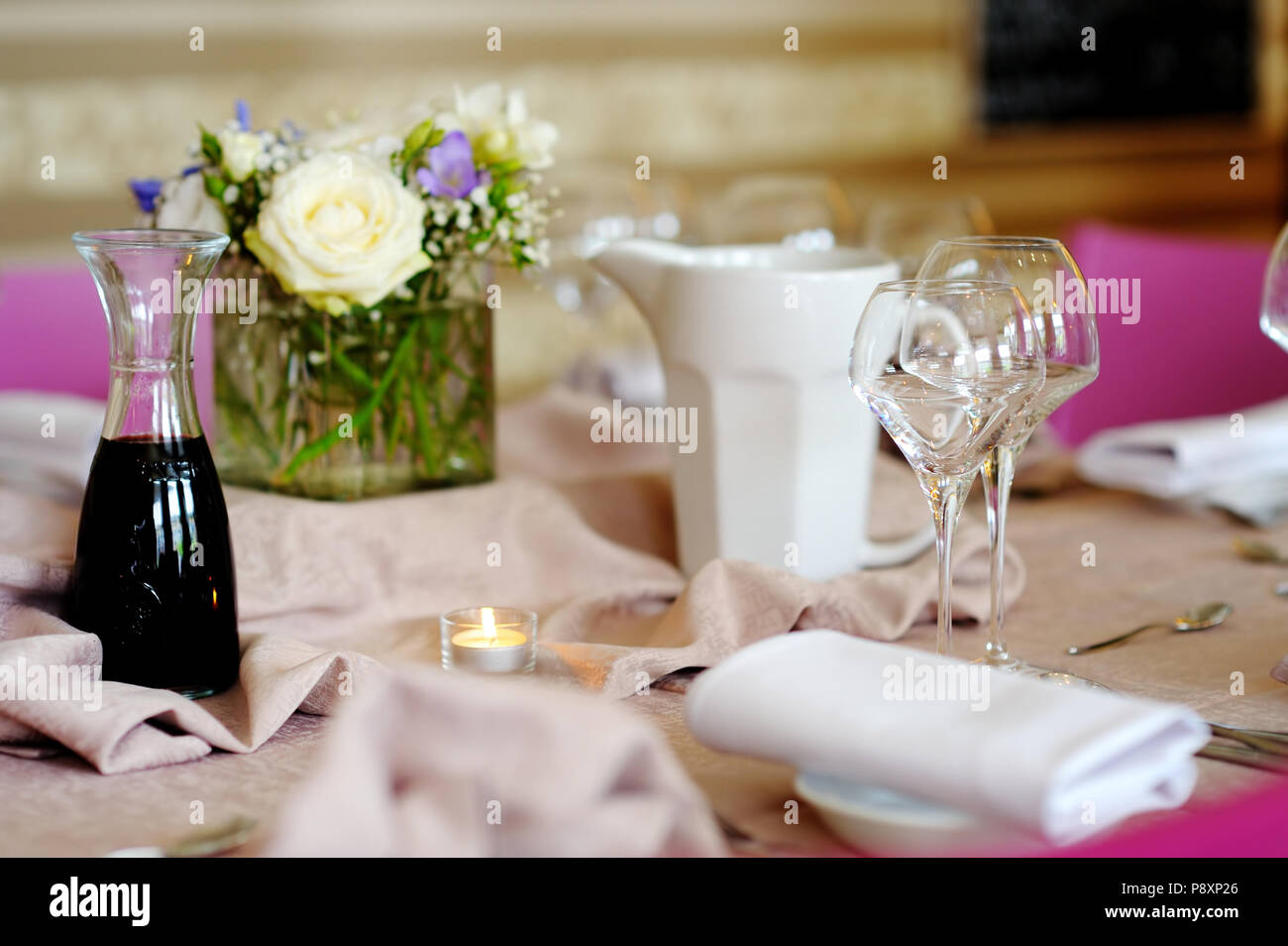 Beautiful table set for some festive event, party or wedding reception ...
