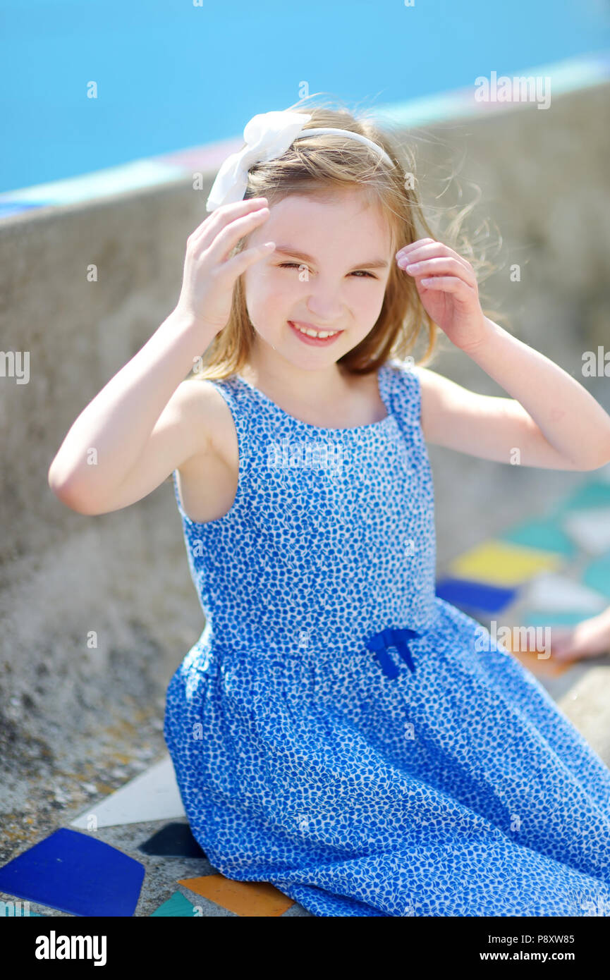 Adorable little girl on warm and sunny summer day Stock Photo - Alamy
