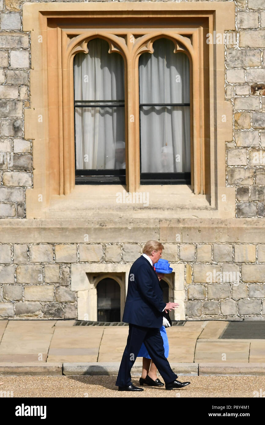 Queen Elizabeth II and US President Donald Trump walk in the Quadrangle ...