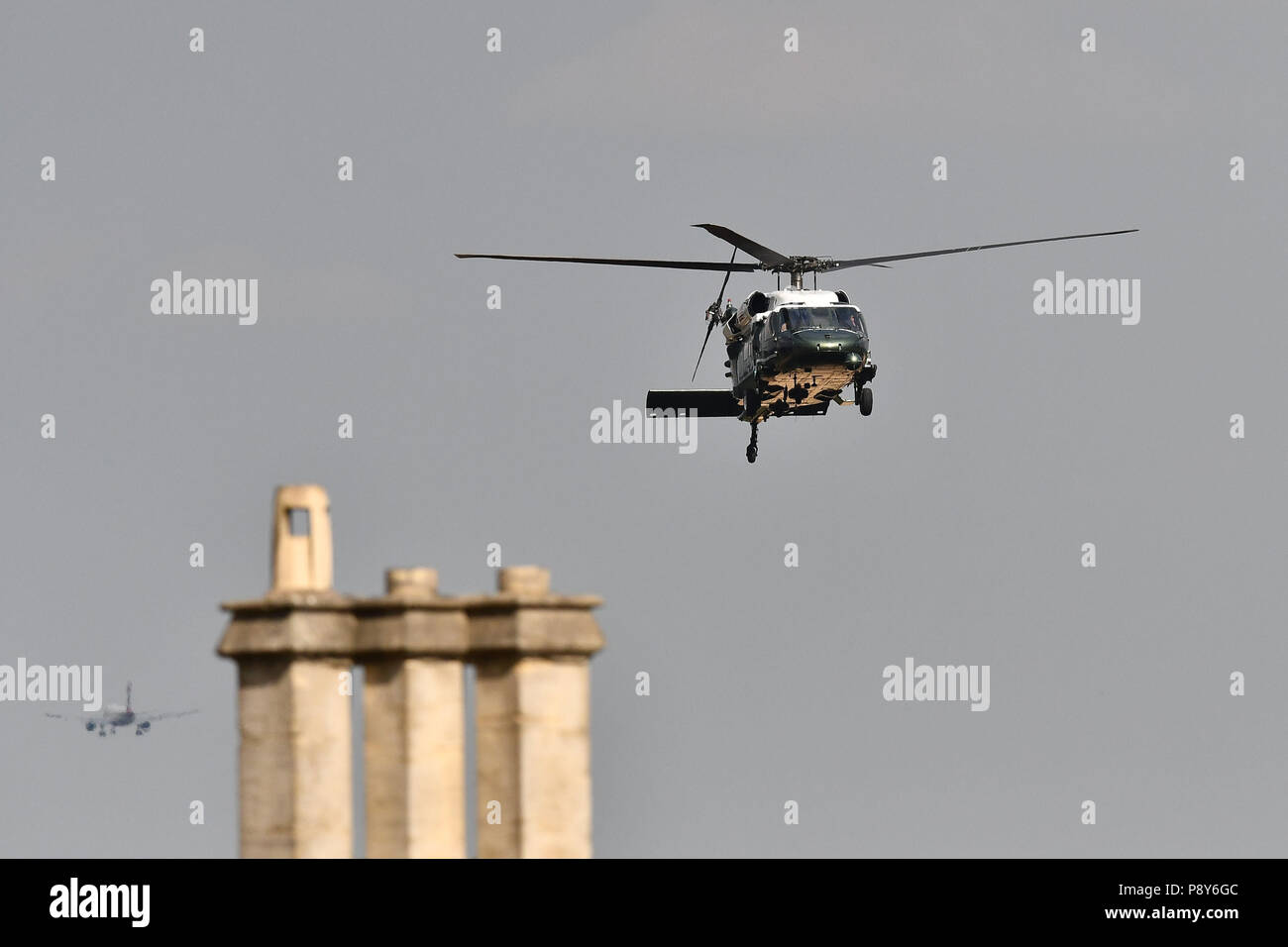 US President Donald Trump arrives by helicopter at Windsor Castle ...