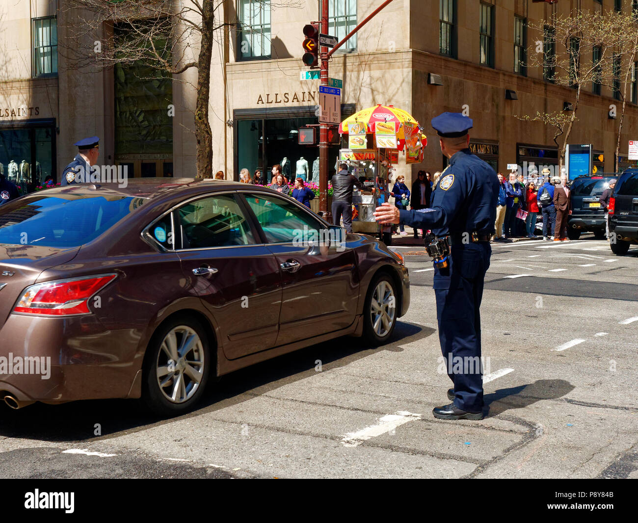 Nypd traffic officer directing traffic hi-res stock photography and ...