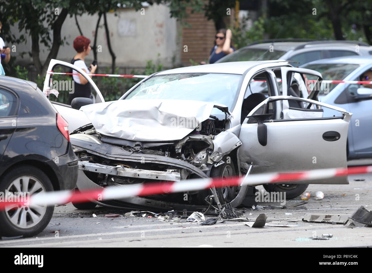 BUCHAREST, ROMANIA - JULY 13: Several vehicles are damaged on the road ...