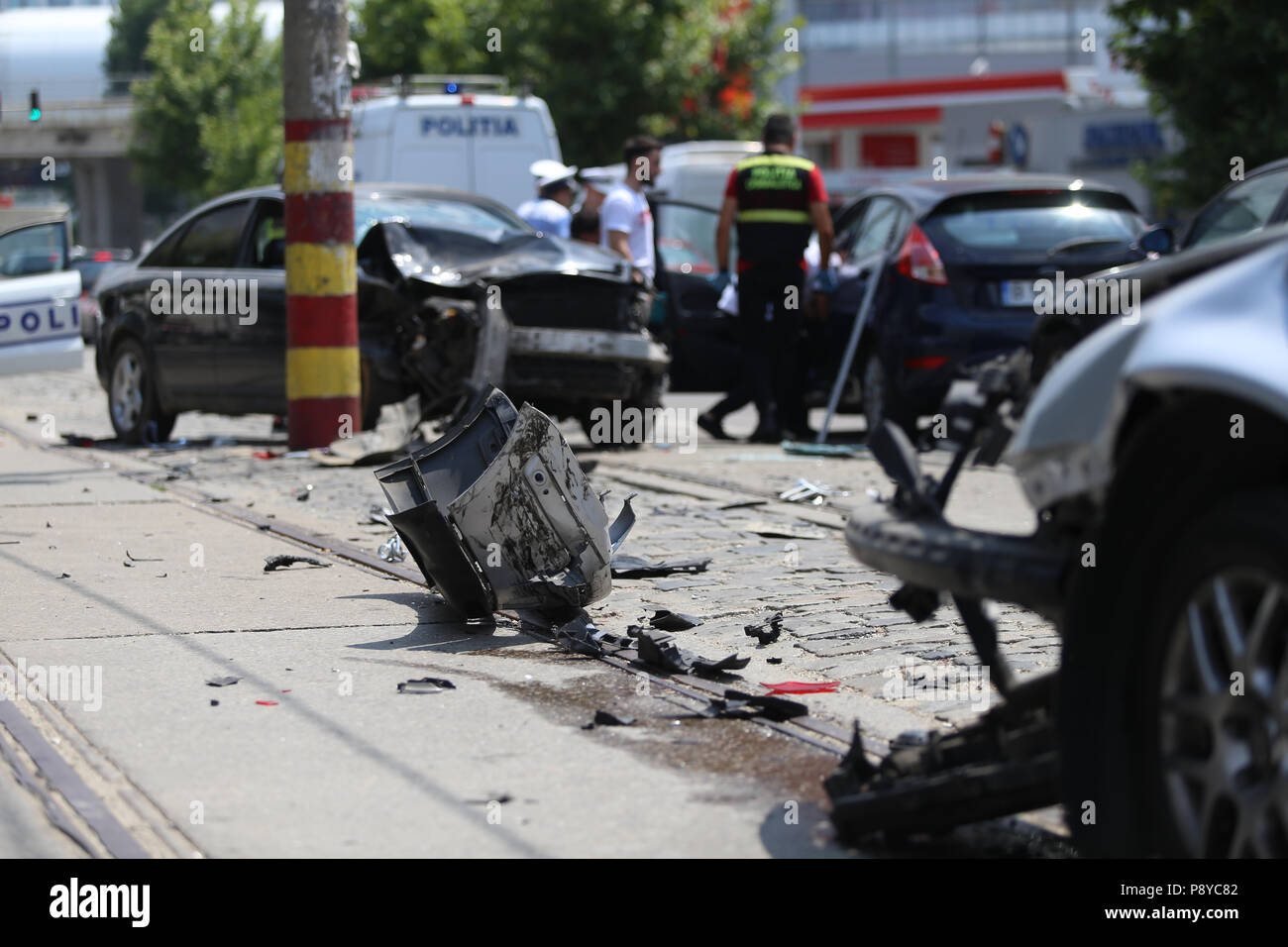 BUCHAREST, ROMANIA - JULY 13: Several vehicles are damaged on the road ...