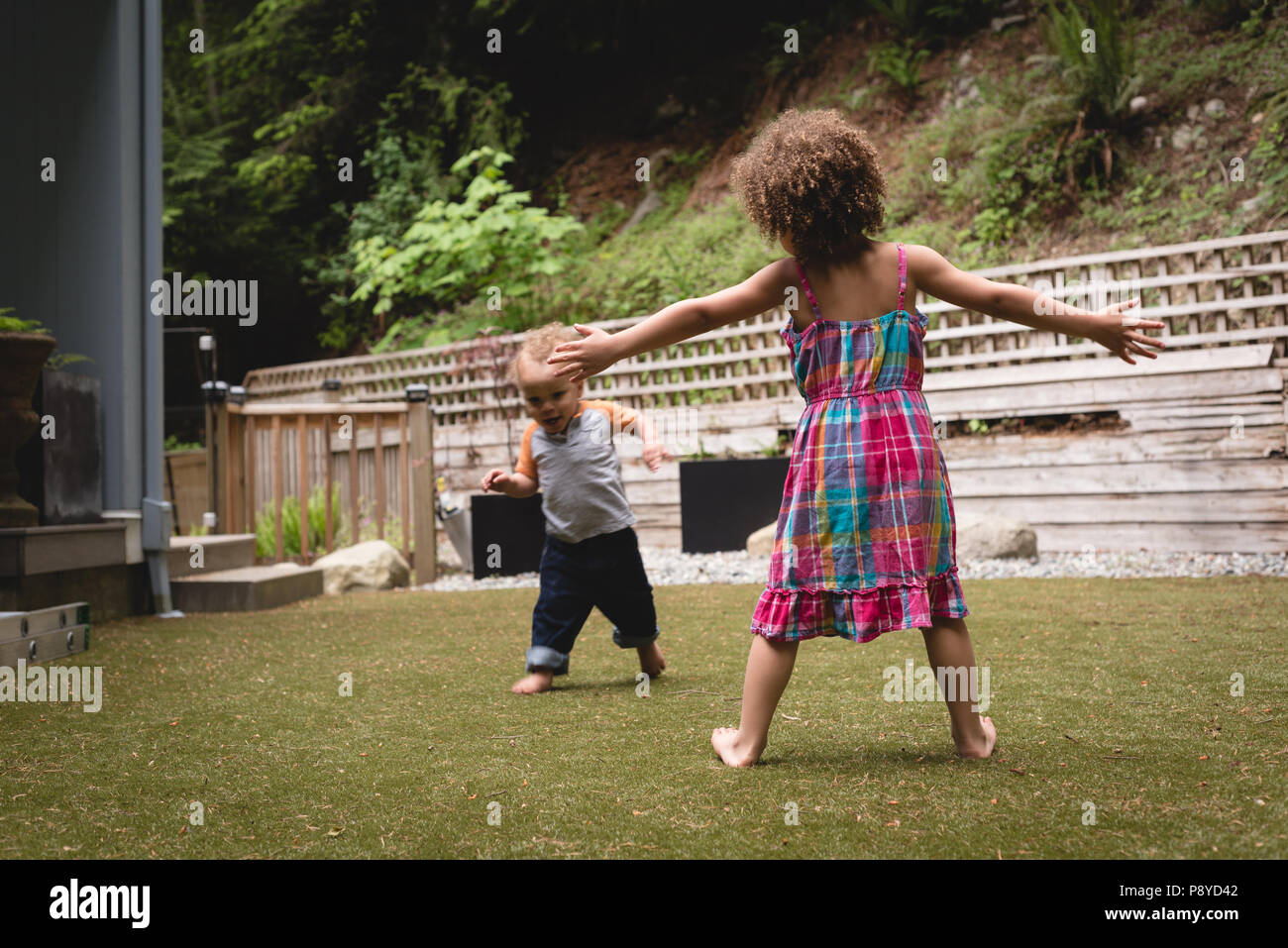 Siblings playing together hi-res stock photography and images - Alamy