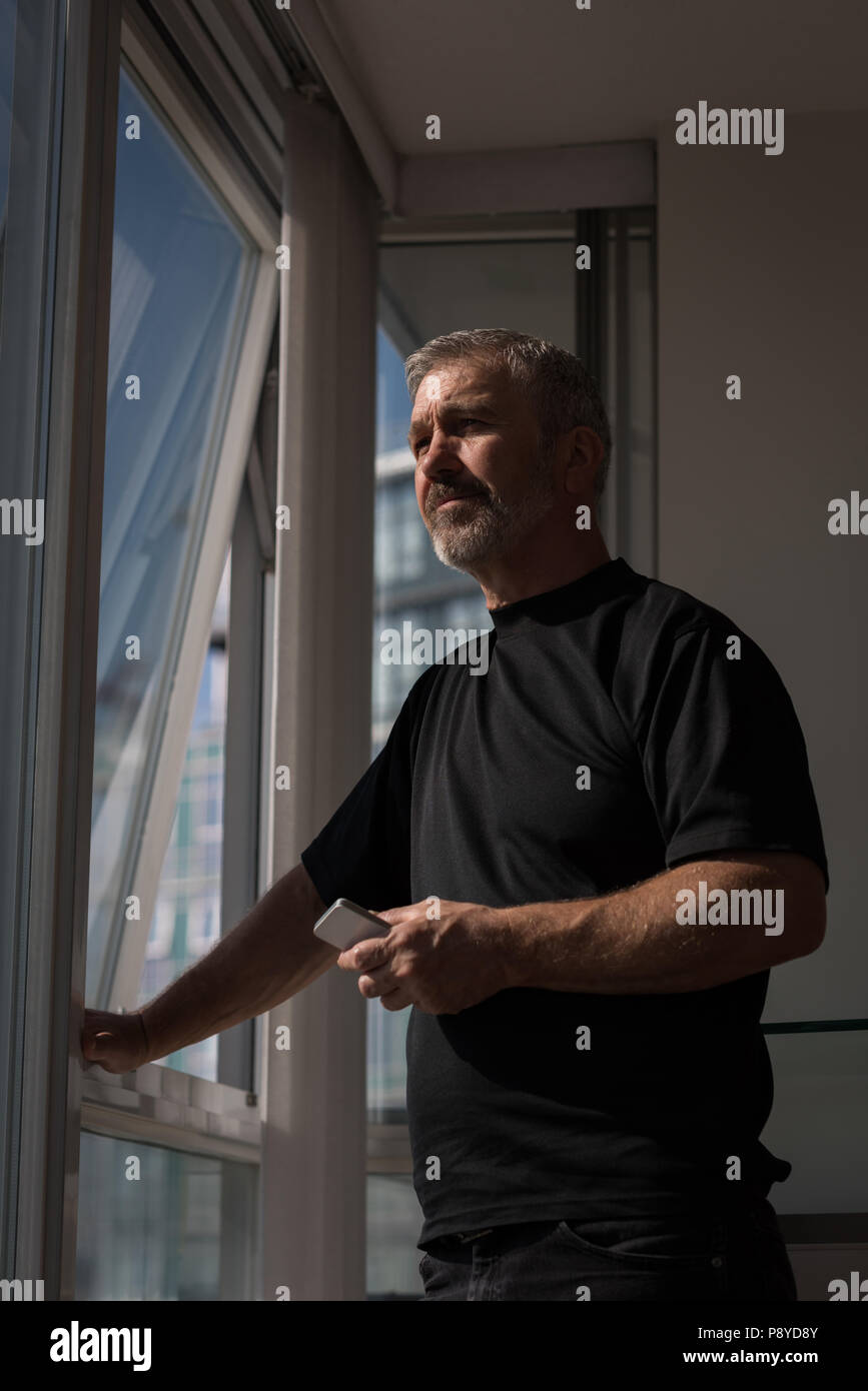 Man looking through transparent hi-res stock photography and images - Alamy