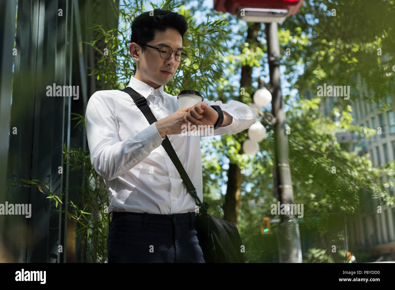 Man standing on pavement hi-res stock photography and images - Alamy