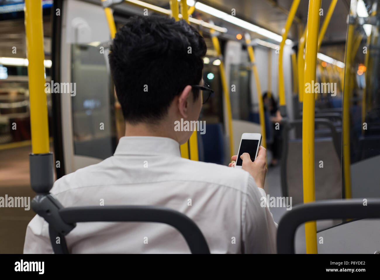 Mobile train man hi-res stock photography and images - Alamy