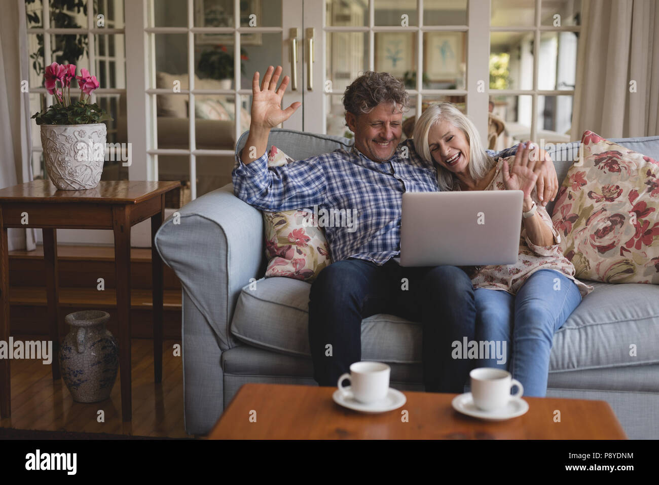 Senior couple doing a video call at home Stock Photo - Alamy