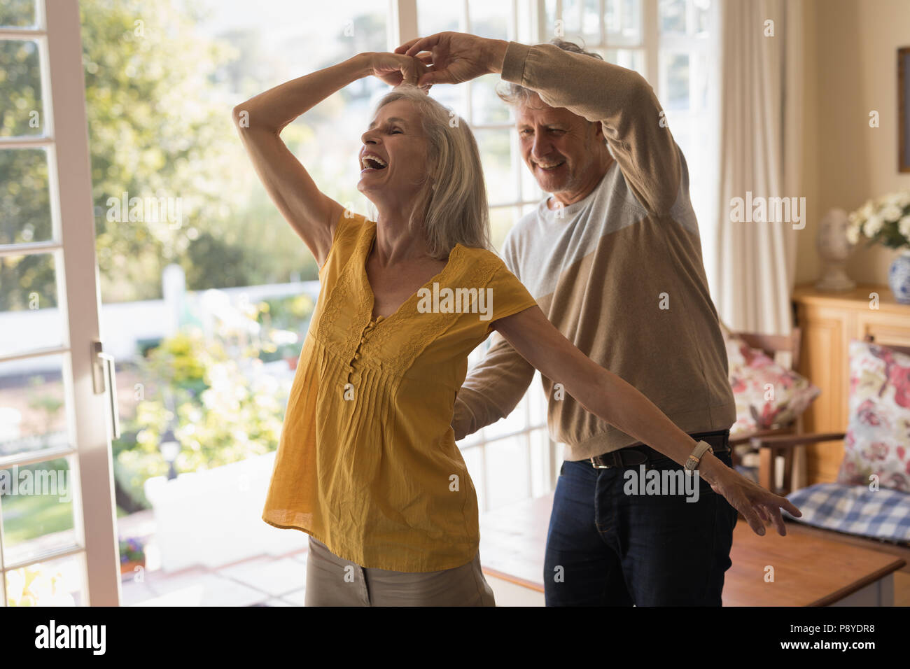 Romantic senior couple dancing together Stock Photo - Alamy