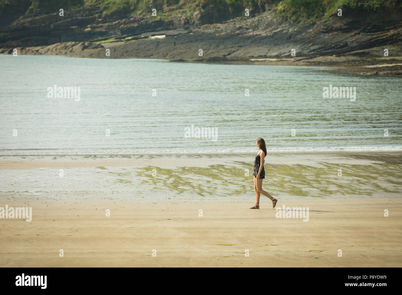 Walking on a beach with sunlight hi-res stock photography and images ...