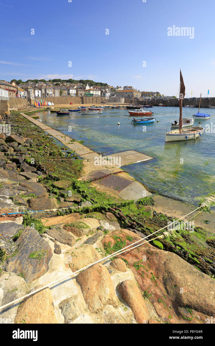Boats in Mousehole harbour, Cornwall, England, UK Stock Photo - Alamy