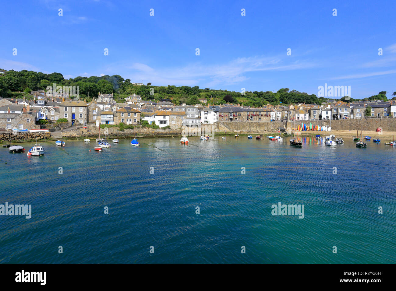 Boats in Mousehole harbour, Cornwall, England, UK Stock Photo - Alamy