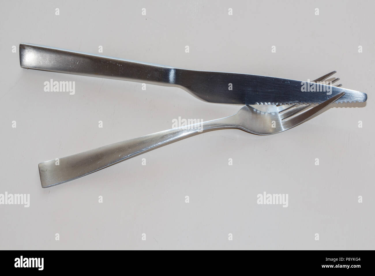 Crossed knife and fork hi-res stock photography and images - Alamy