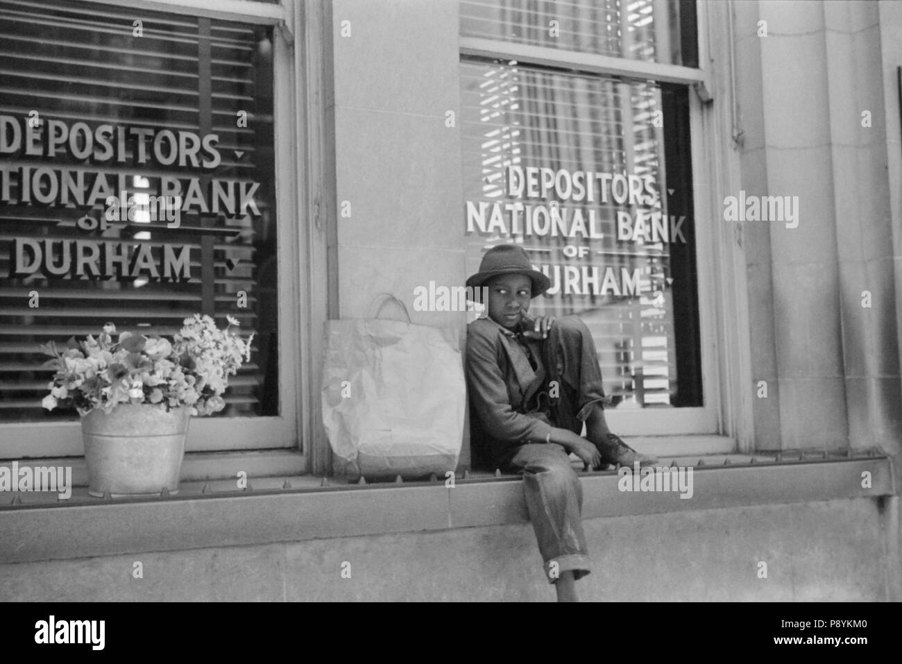 Young Flower Vendor, Durham, North Carolina, USA, Jack Delano, Office of War Information, May ...