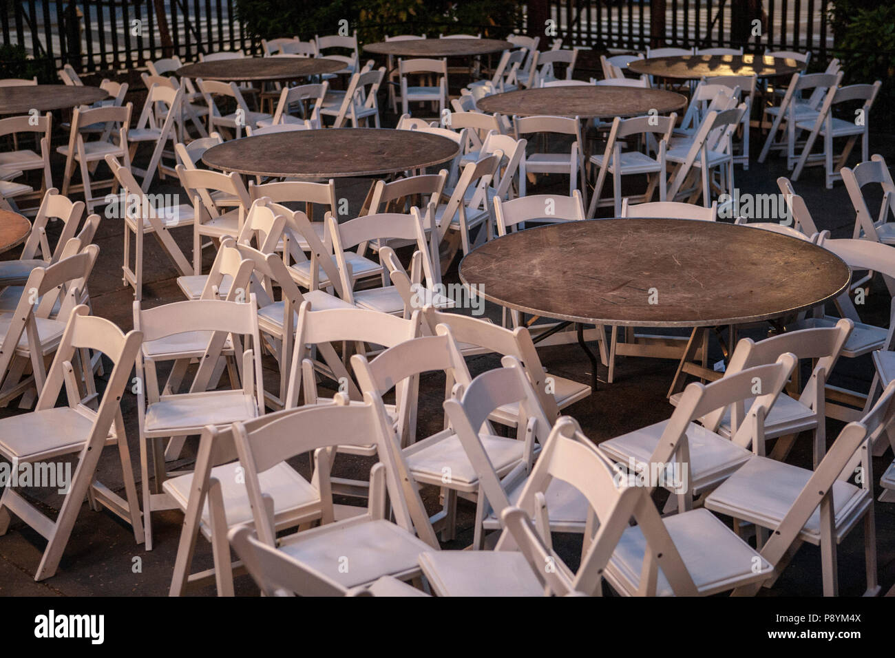 Scattered Tables and Chairs Stock Photo - Alamy