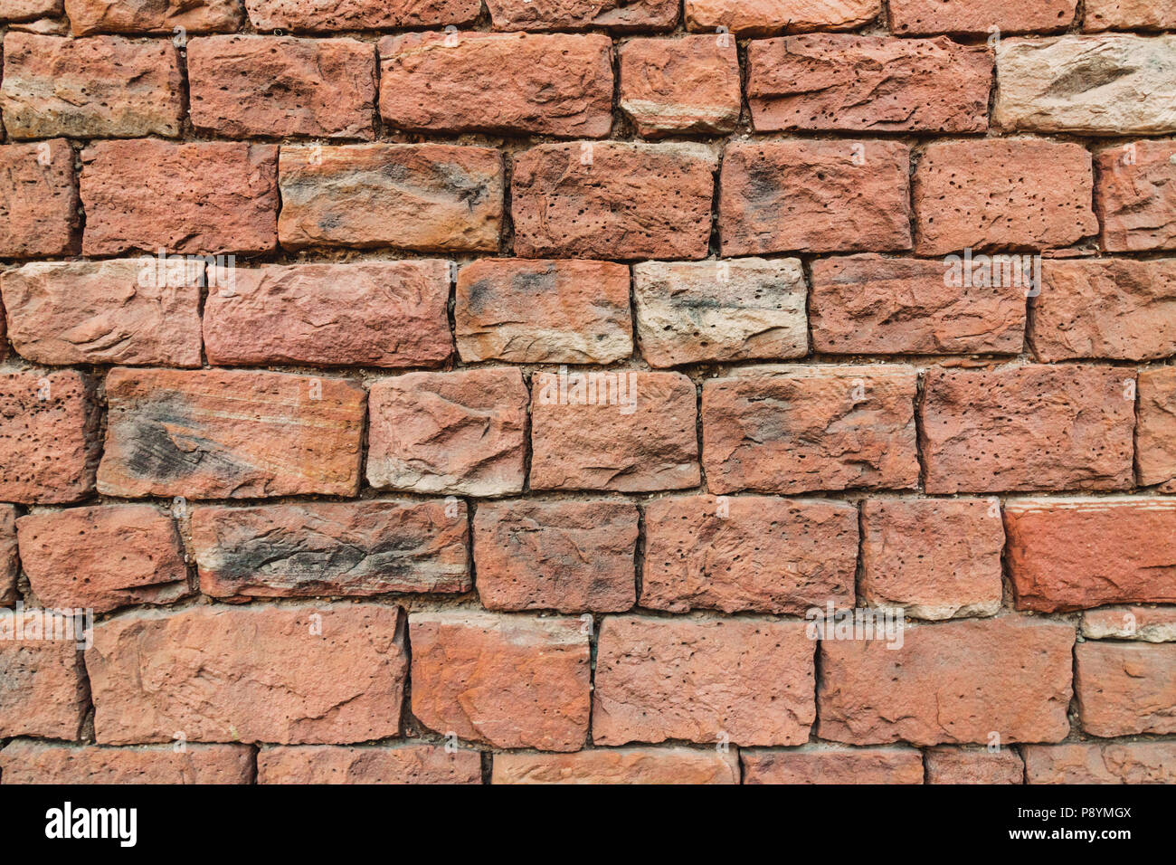 Old handmade brick wall Stock Photo - Alamy